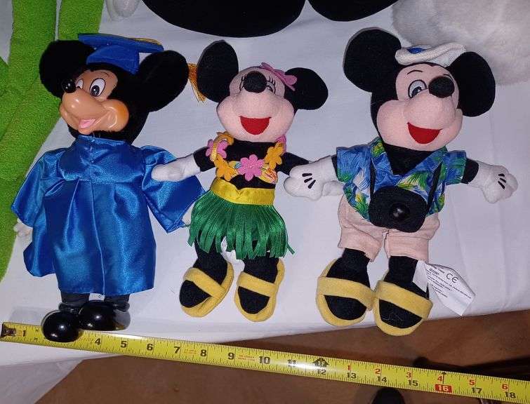 Plush animals including Mickey Mouse, Curious George, Snoopy, Kermit ...