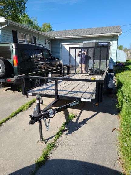 Quality Steel Open Tow Behind Trailer with Tailgate Ramp - Ness Bros ...