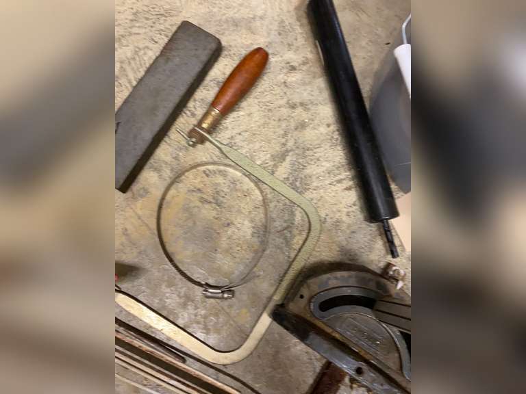 Chalk guns, tools in a bucket