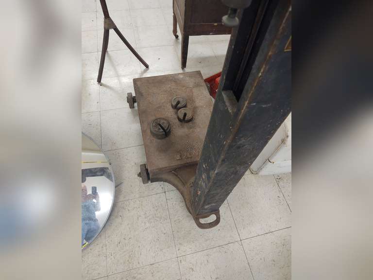 Antique Howe platform scale with weights.
