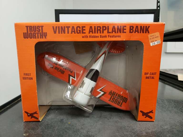 Vintage airplane bank - Northern Kentucky Auction, LLC