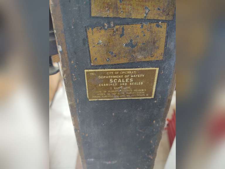 Antique Howe platform scale with weights.