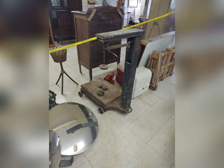 Antique Howe platform scale with weights.