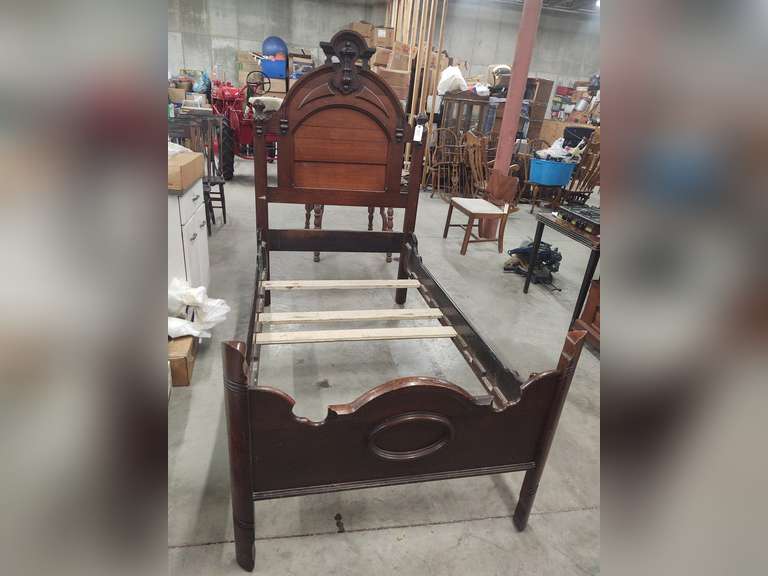 Antique three quarter bed frame. 39"x75". Believe to be walnut.