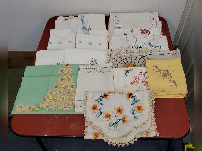 Various pillow cases and various embroidered table linens