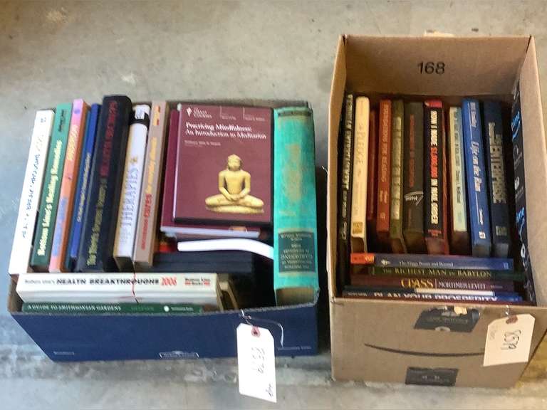 Two boxes of books with assorted authors and topics along with some ...