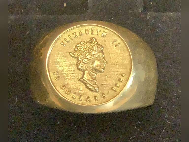 Ring with Queen Elizabeth II 10 Dollars 1944 (?) embossed on the top ...