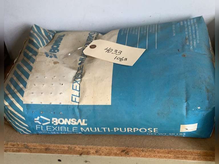 50 lb bag of Bonsal thin set and 2 cartons of ceramic tile. 14” x 14 ...
