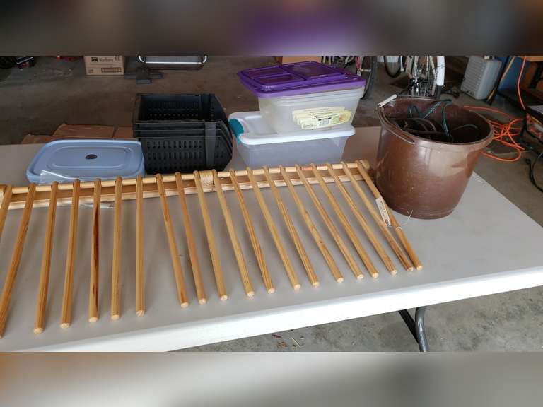 Drying rack, bucket, plastic bins and electric cords