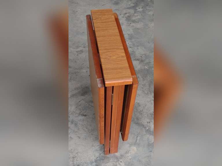 Fold up table approximately 16" deep, 31" long, 20" tall. 3 1/2" wide ...