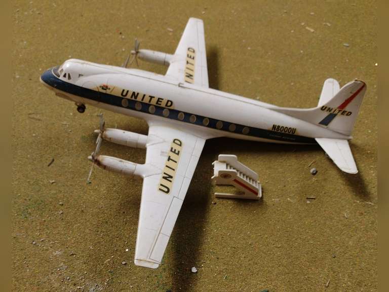 Model United Airlines prop plane and passenger ladder.