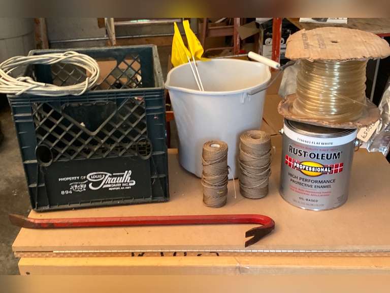 Trauth Dairy crate, crowbar, Rustoleum white paint, roll of tubing, and ...