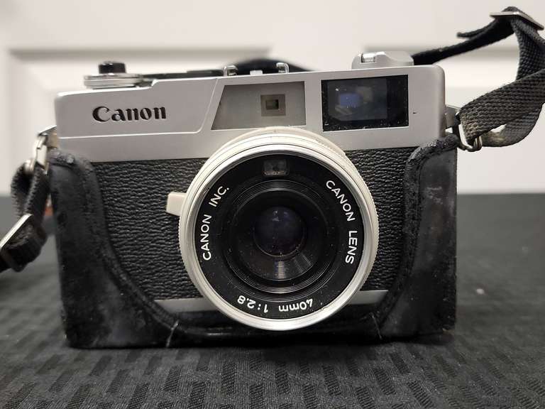 Canon Canonet 28 camera with leather case - Northern Kentucky Auction, LLC