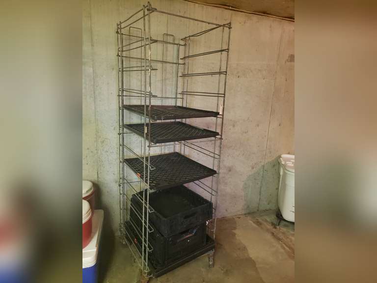 Rolling metal bread rack, 25x22x74in