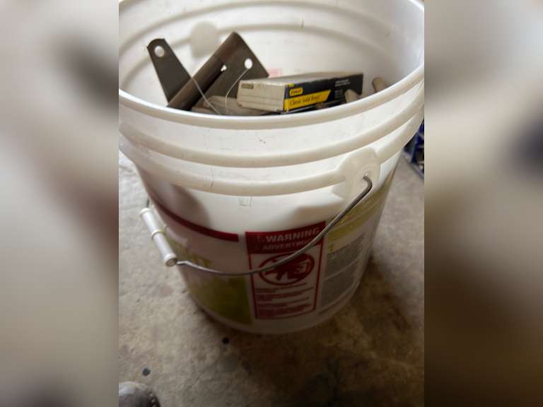 Bucket full of door hinges Bucket full of door hinges