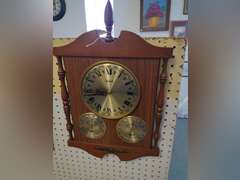 Verichron battery operated wall clock with barometer and thermometer.
