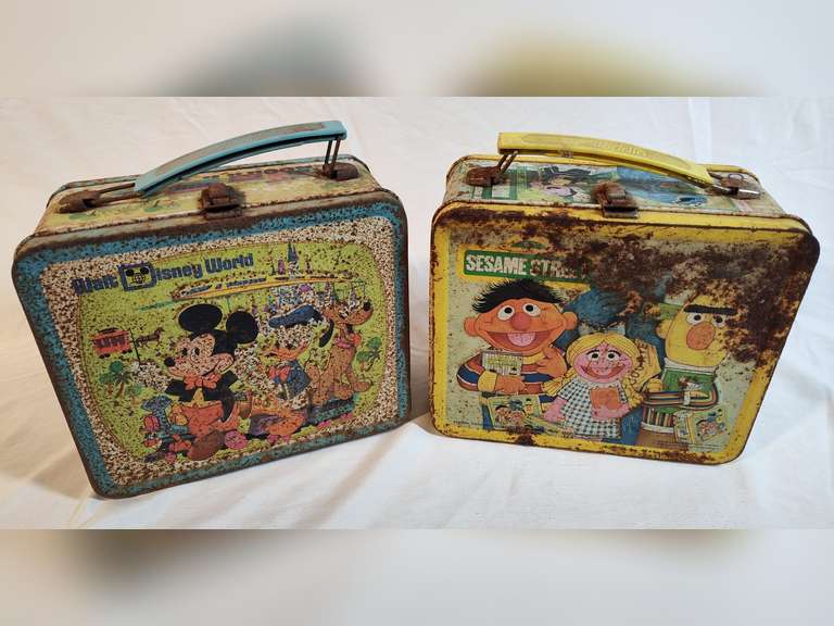 2 Old lunch boxes-Sesame Street and Walt Disney-both show rust