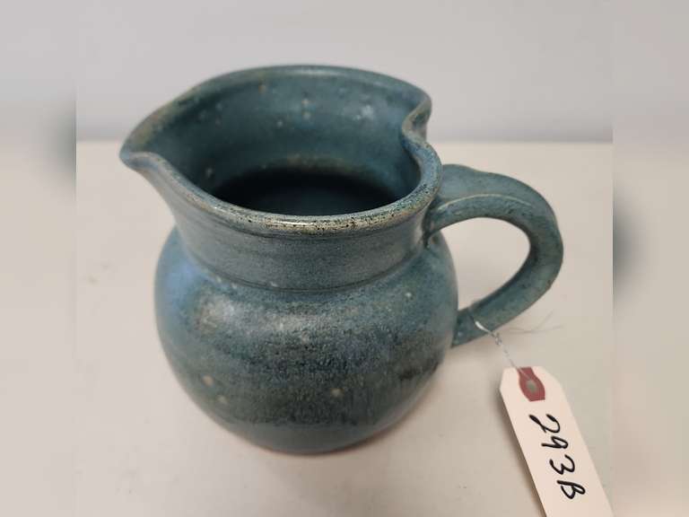 Signed pottery pitcher