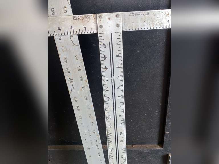 Large metal T-square and large metal ruler - Northern Kentucky Auction, LLC