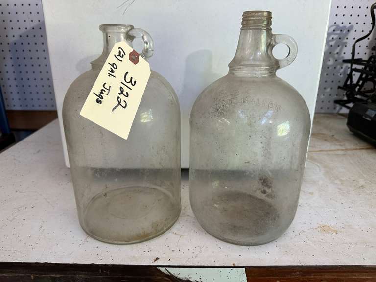 2- One gallon jugs with thumb handles - Northern Kentucky Auction, LLC