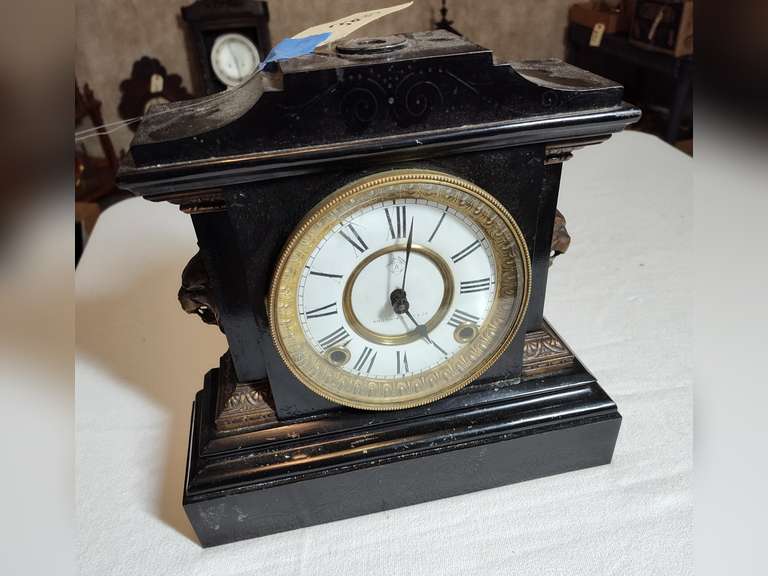 Heavy metal clock - Northern Kentucky Auction, LLC