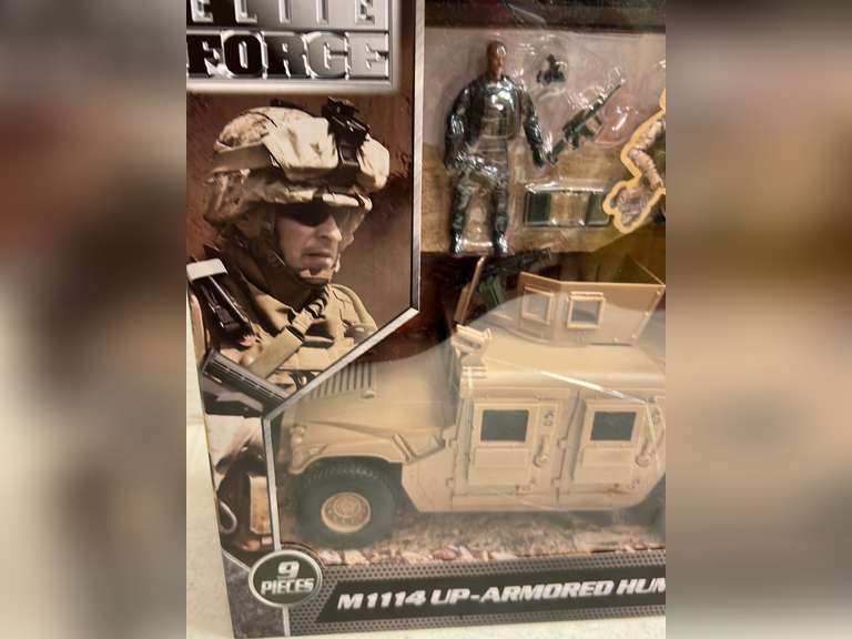 Elite Force M1114 UP-Armored Humvee. - Northern Kentucky Auction, LLC