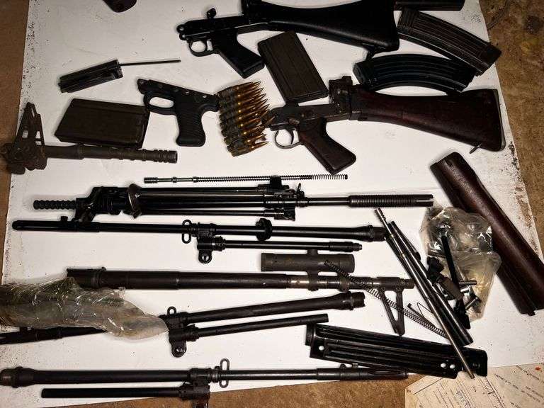 Military gun parts and surplus items - Nutt Auction