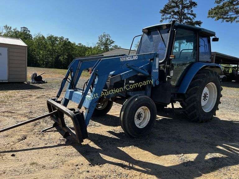 New Holland TL90 Cab Tractor with NH 7310 Loader - Nutt Auction