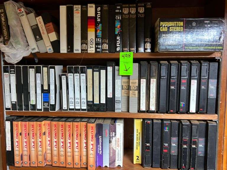 8 Shelves of Assorted VCR Tapes - NW Asset Services
