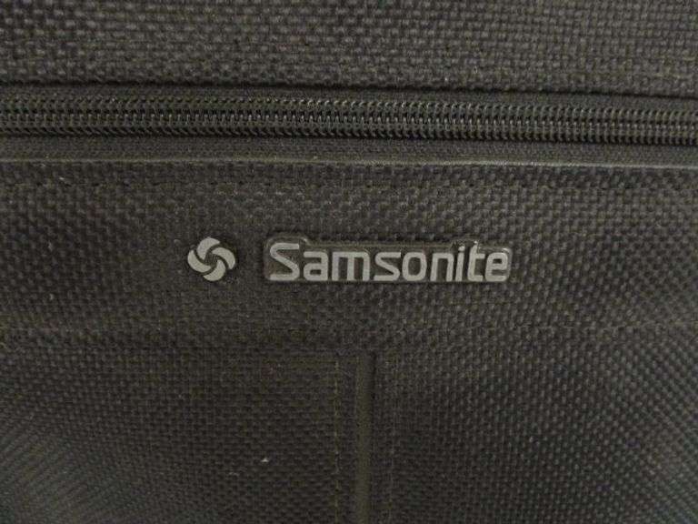 Samsonite Rolling Carry On Luggage - Oberman Auctions
