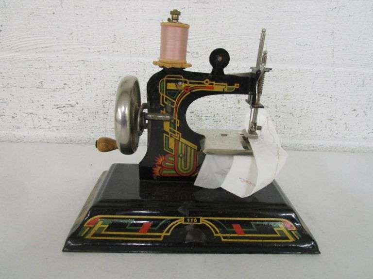 Casige 116 Pressed Steel Toy Sewing Machine - Oberman Auctions