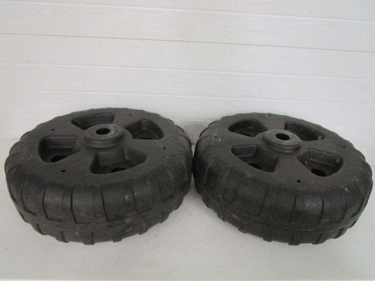Pair of Hard Plastic Dock Wheels - Oberman Auctions
