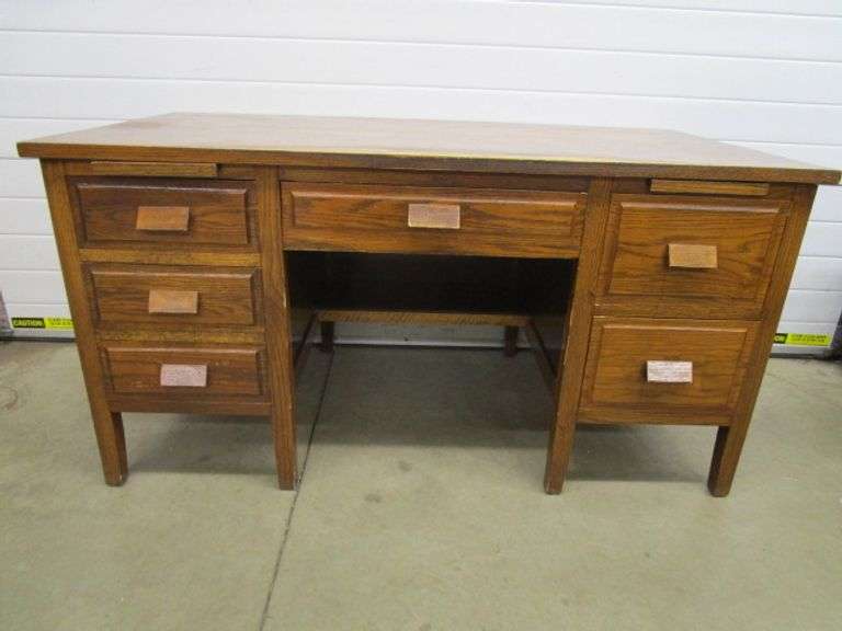 Oak 6 Drawer Office Desk - Oberman Auctions