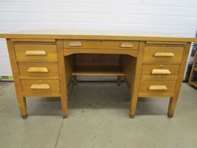 Oak 6 Drawer Office Desk - Oberman Auctions
