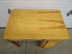 Maple 7 Drawer Student Desk - Oberman Auctions