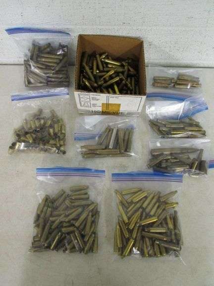 Assortment of Different Cal. Used Brass Shell Casings - Oberman Auctions