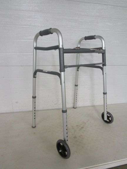 Pro Basics Folding Adjustable Walker w/Front Wheels - Oberman Auctions