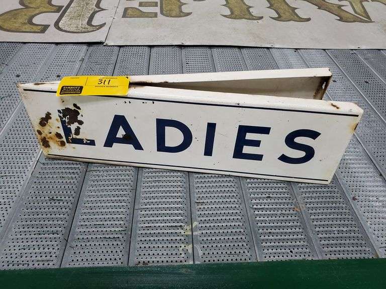 Porcelain triangular-shaped Ladies restroom sign - Parrott Marketing Group