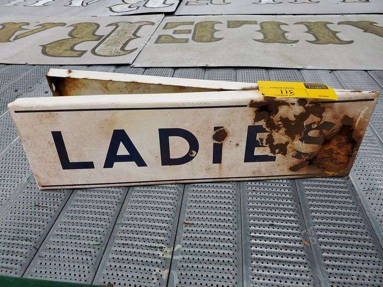 Porcelain triangular-shaped Ladies restroom sign - Parrott Marketing Group