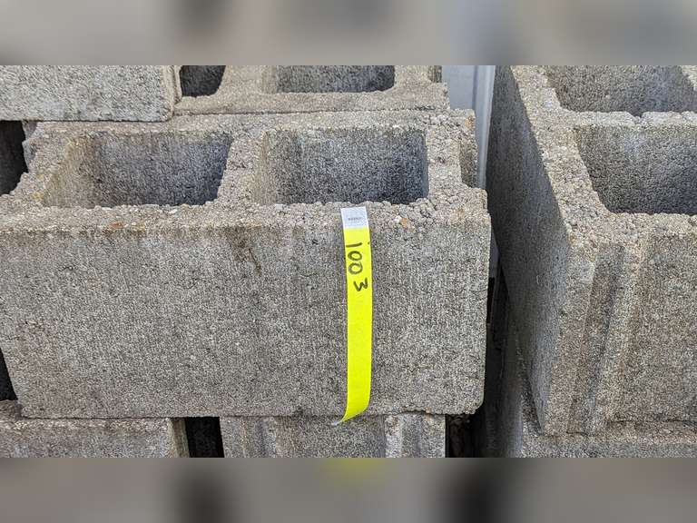 Large Group of Concrete Cinder Blocks - Parrott Marketing Group