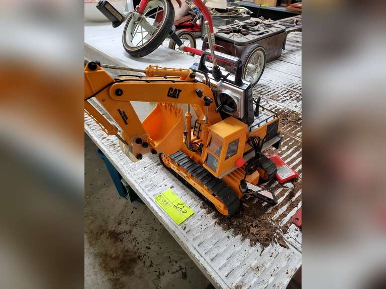 Remote control CAT loader - Parrott Marketing Group