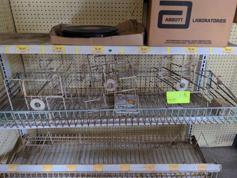 3 spinning magazine racks - Parrott Marketing Group