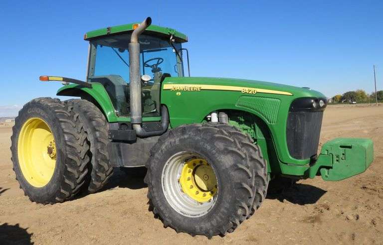 T-100 2002 John Deere 8420 MFWD Tractor - Pickett Auction Service