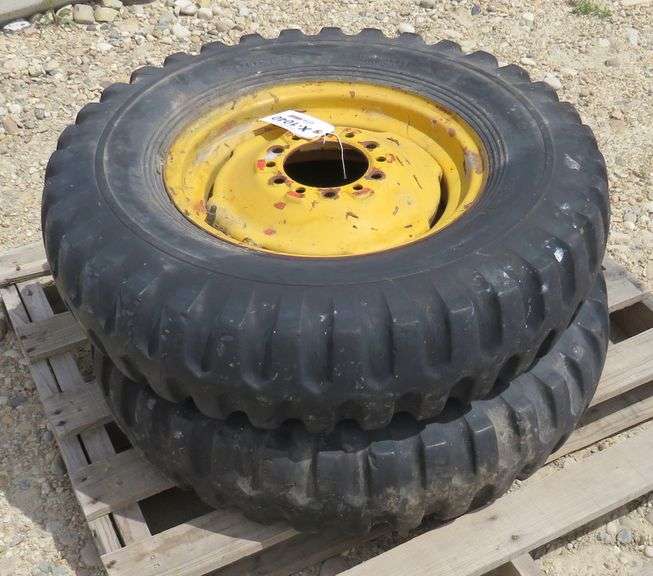 X-1040 Ford Tractor Tires & Wheels (2) - Pickett Auction Service
