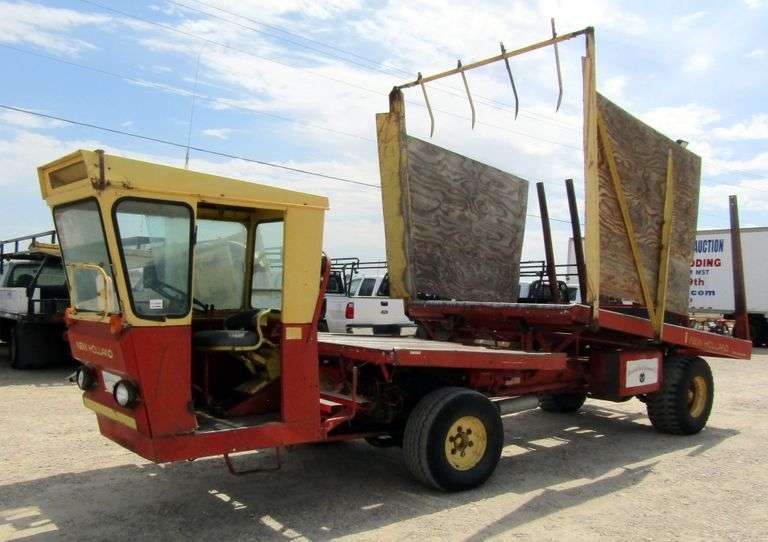 Y-1460 New Holland Super 1048 Stack Wagon - Pickett Auction Service
