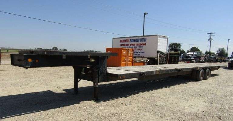 Y-1289 1977 Bucko 45' 5th Wheel Flatbed Trailer - Pickett Auction Service