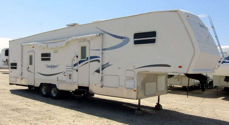 Y-1216 2004 Sandpiper Toy Hauler Travel Trailer - Pickett Auction Service