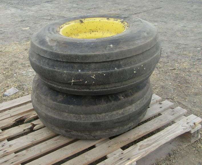 E-145 John Deere Front Tractor Tires - Pickett Auction Service
