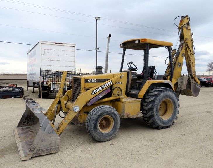 B-1399 John Deere 410D Backhoe Loader - Pickett Auction Service