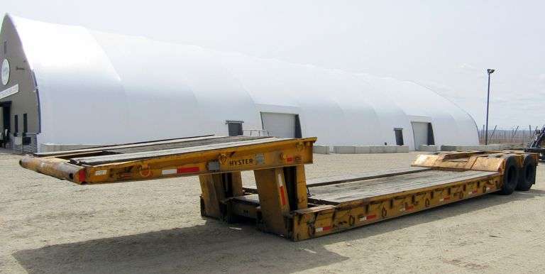 D-1220 1977 Hyster Folding Neck Low Boy Trailer - Pickett Auction Service